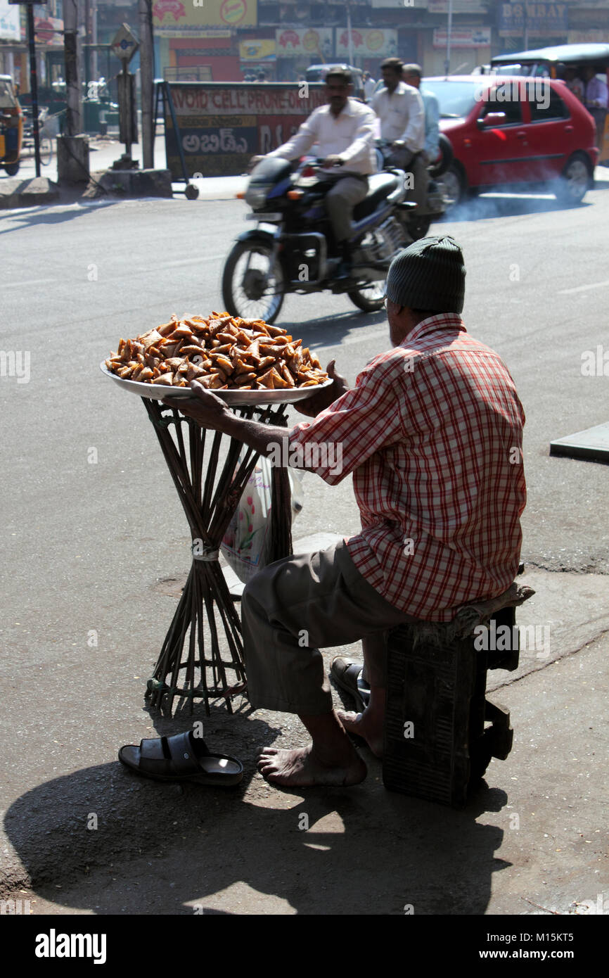 Indian man selling food on the street Hyderabad India Stock Photo - Alamy