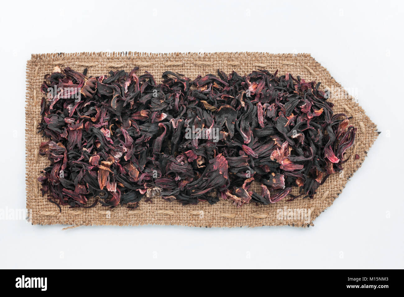 Arrow made of burlap with dry hibiscus leaves. Pointer for advertising ...