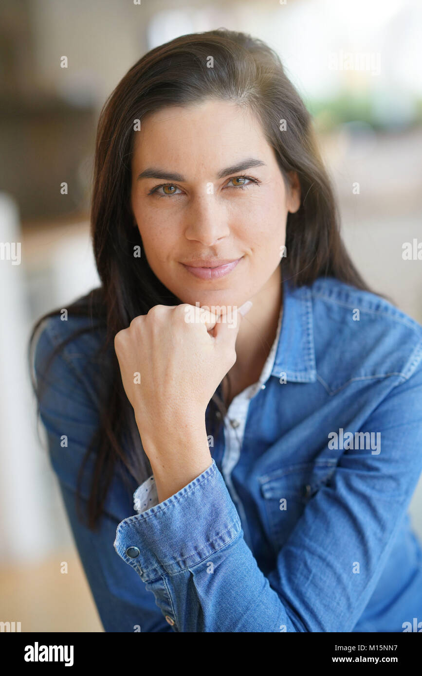 Portrait of middle-aged woman looking at camera Stock Photo - Alamy