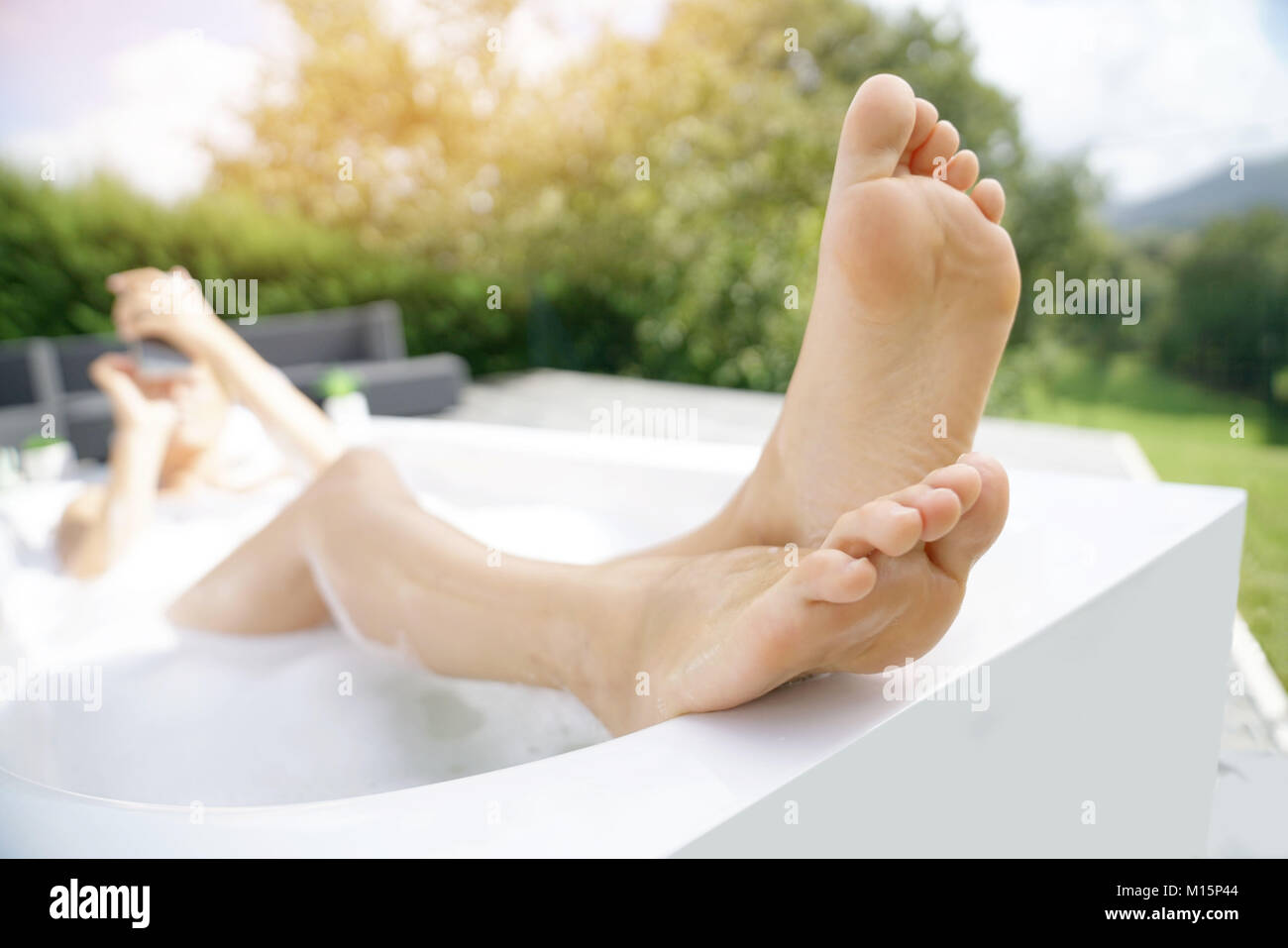 Womans feet in bathtub hi-res stock photography and images - Alamy