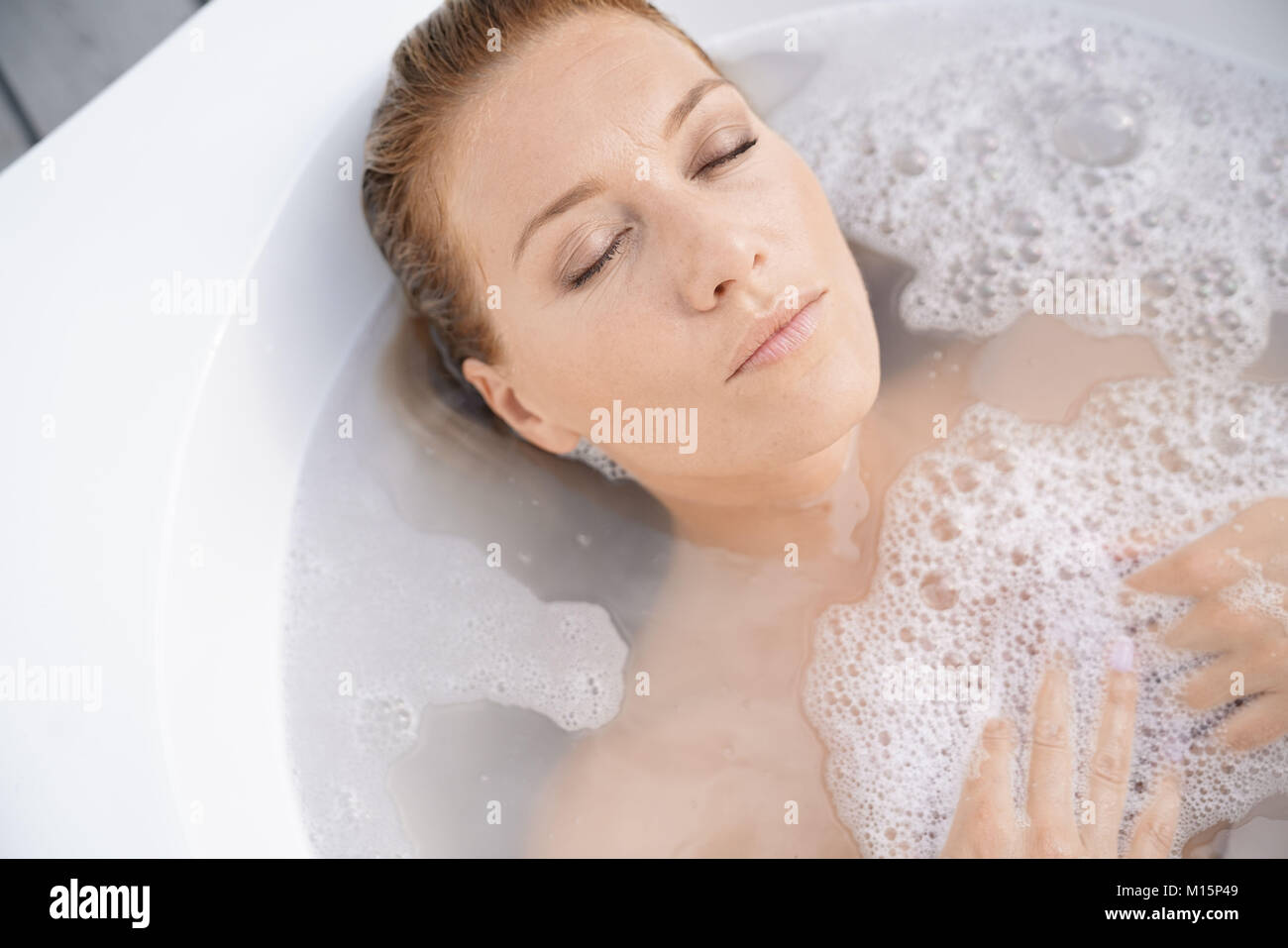 upper view of woman relaxing in bath Stock Photo - Alamy