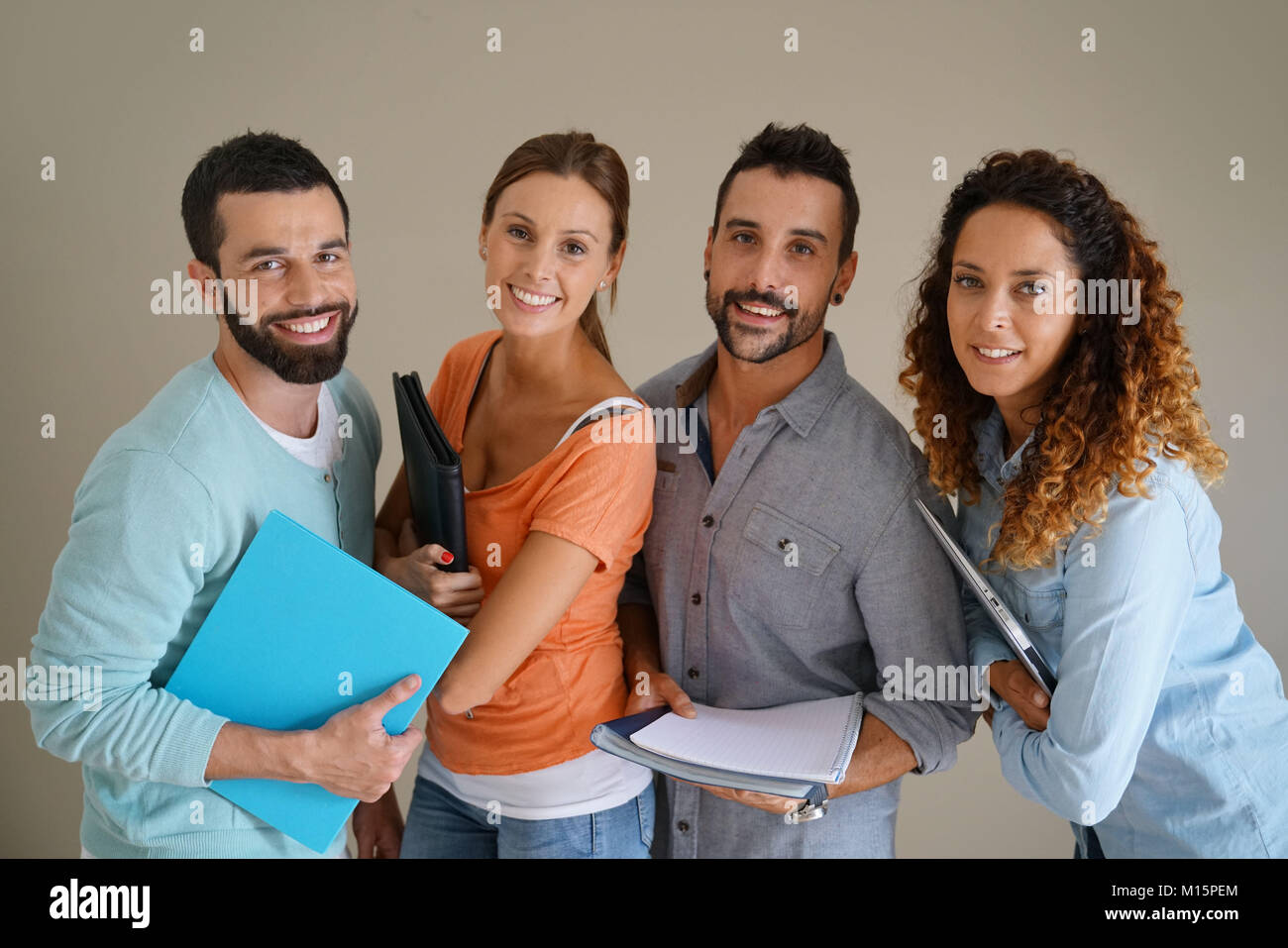 Group of happy business school students Stock Photo - Alamy