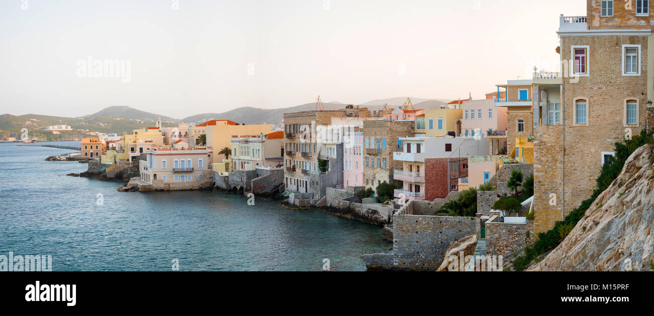 View of Syros town with beautiful buildings and houses in a sunny day ...