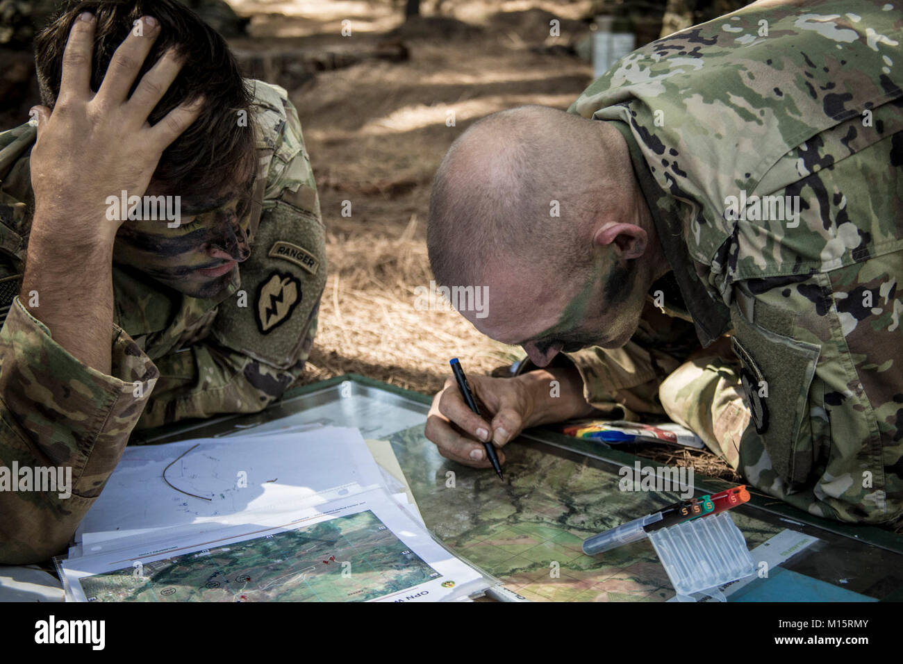 U.S. Army 1st. Lt. Dan Ruckman, left, and 1st. Sgt. Justin Kline, right ...