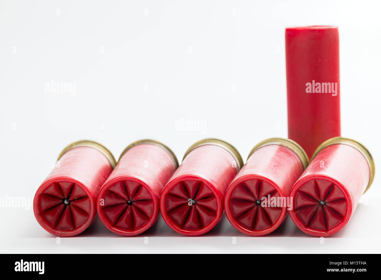 Red bullets for a shotgun with the top exposed Stock Photo - Alamy