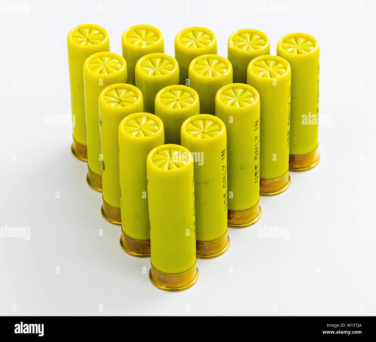 Many shotgun shells on display that are yellow in color Stock Photo - Alamy
