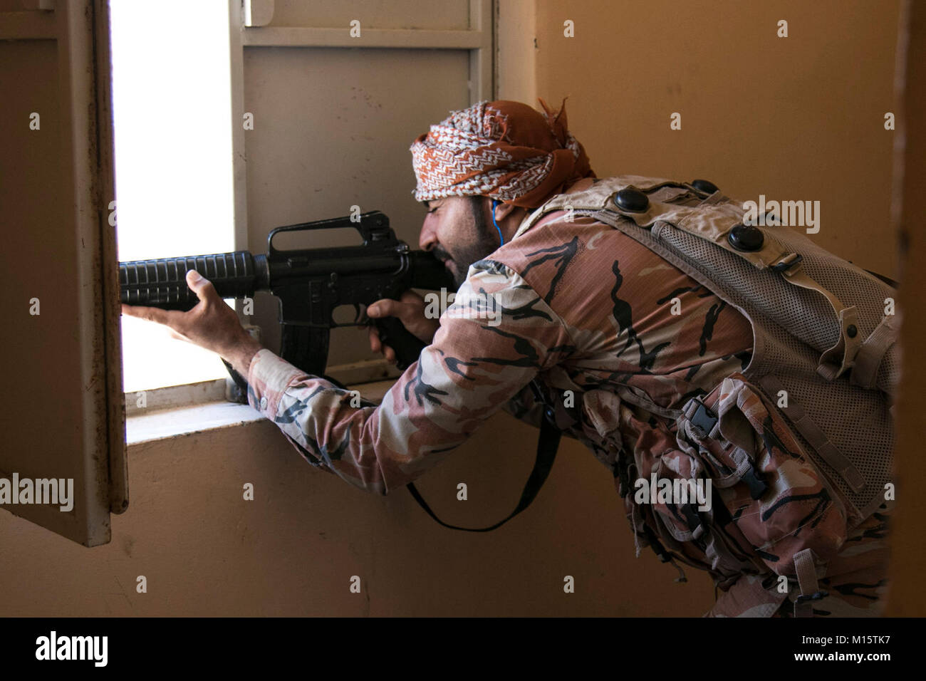 A soldier from the 11th Omani Brigade, Royal Army of Oman, role playing ...