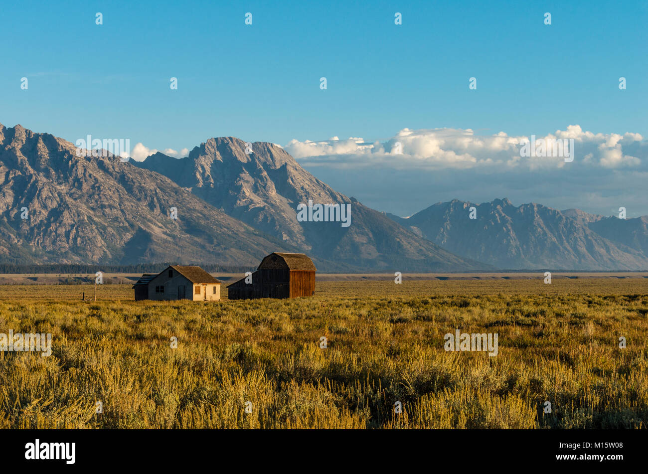 One of the Mormon Row barns with the Teton Mountains in the background ...