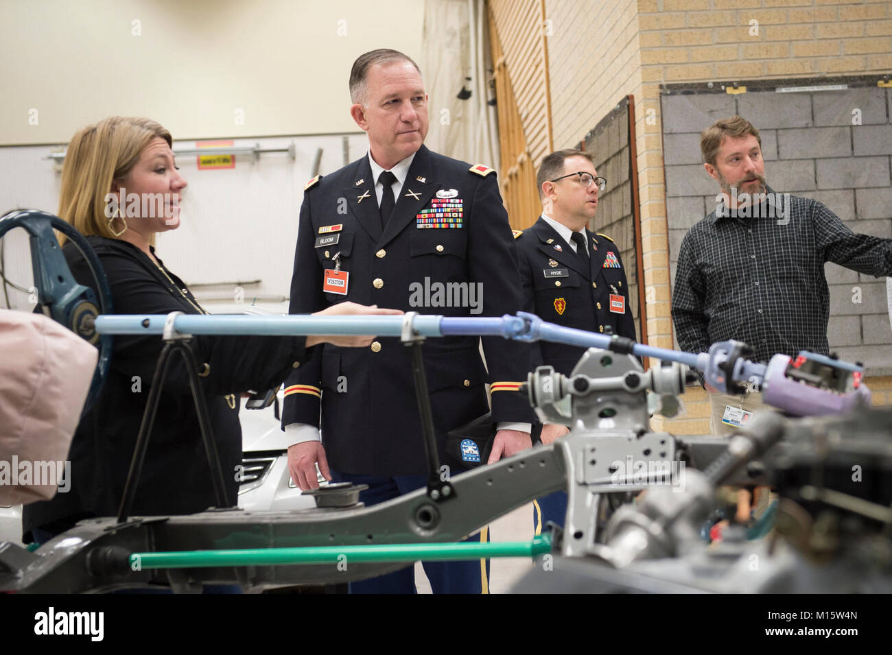 Rebekah Nelson, Communications Manager at USAA gives Col. Eric Bloom ...