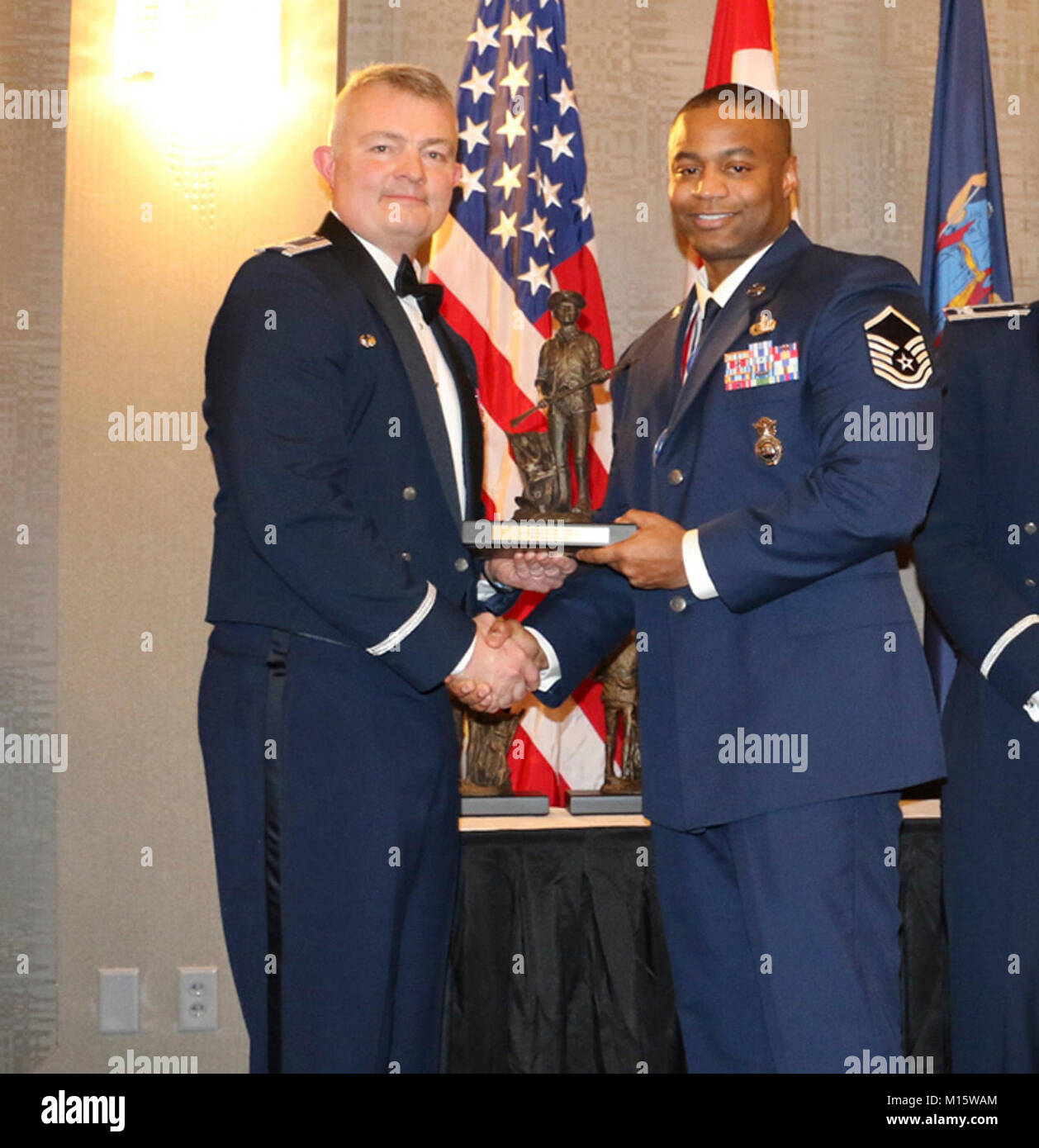 Master Sgt. Bernard Jowers (right) receives the Outstanding Senior NCO ...