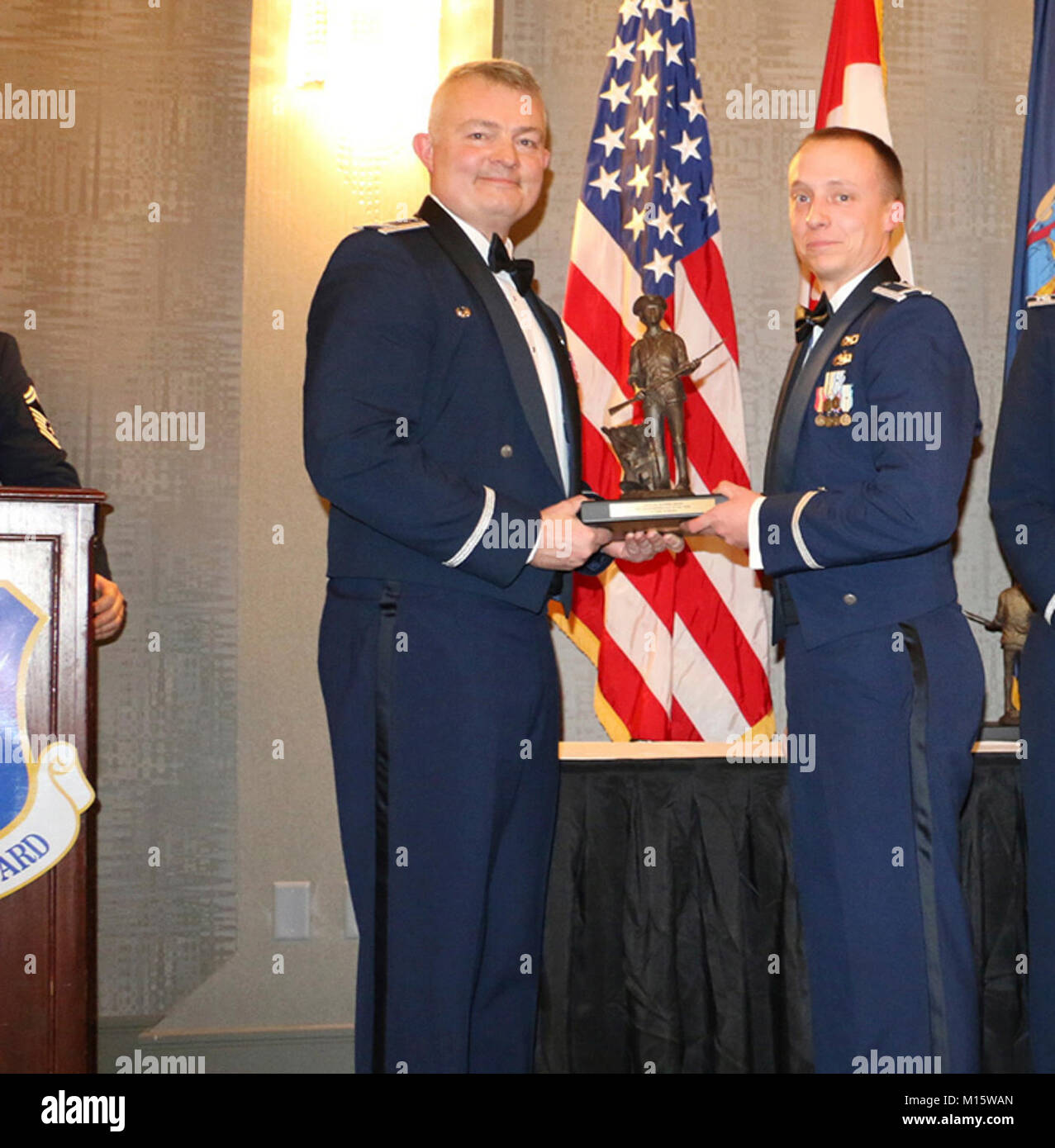 1st Lt. Eric Schenck (right) receives the Outstanding Company Grade ...