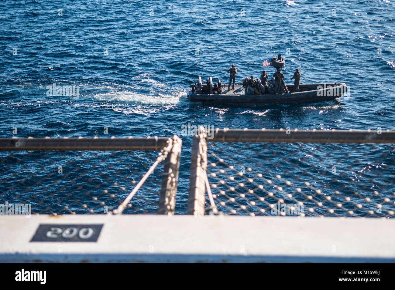 PACIFIC OCEAN (Jan. 22, 2017) Special Boat Team 12 rides alongside the ...