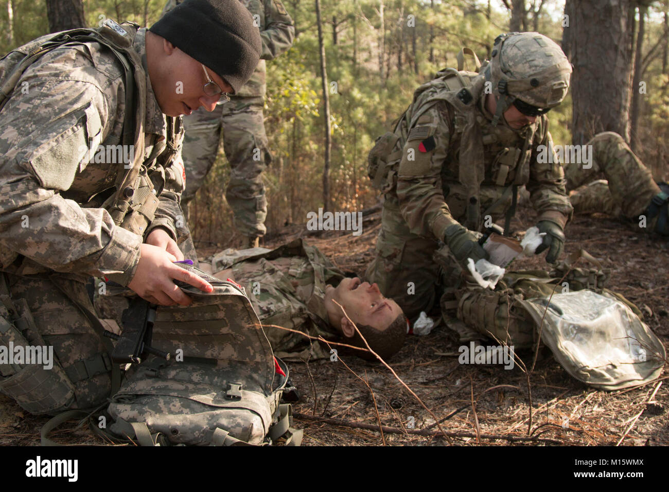 Sgt. Kyle Cabral, a combat medic with 3rd Battalion, 1st Security Force ...