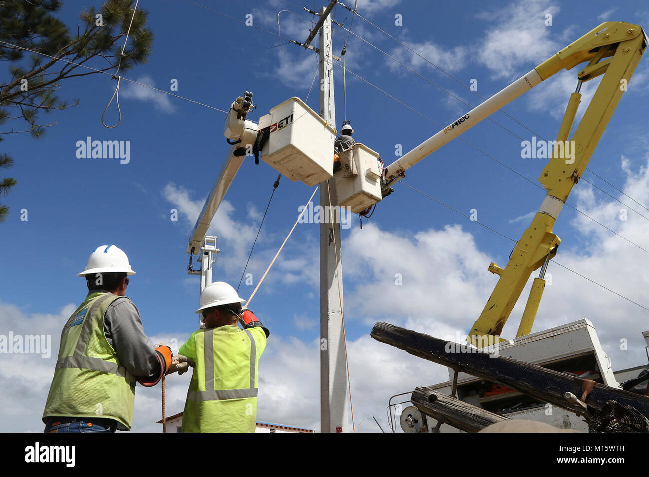 Despite the rugged terrain, power workers with the U.S. Army Corps of ...