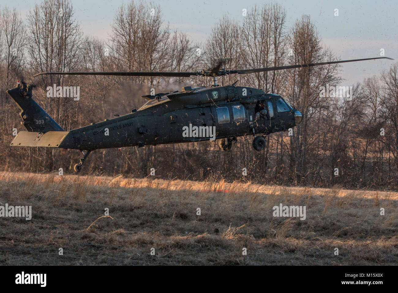 A UH-60 Black Hawk drops its sling load of a Howitzer M119A3 at the ...