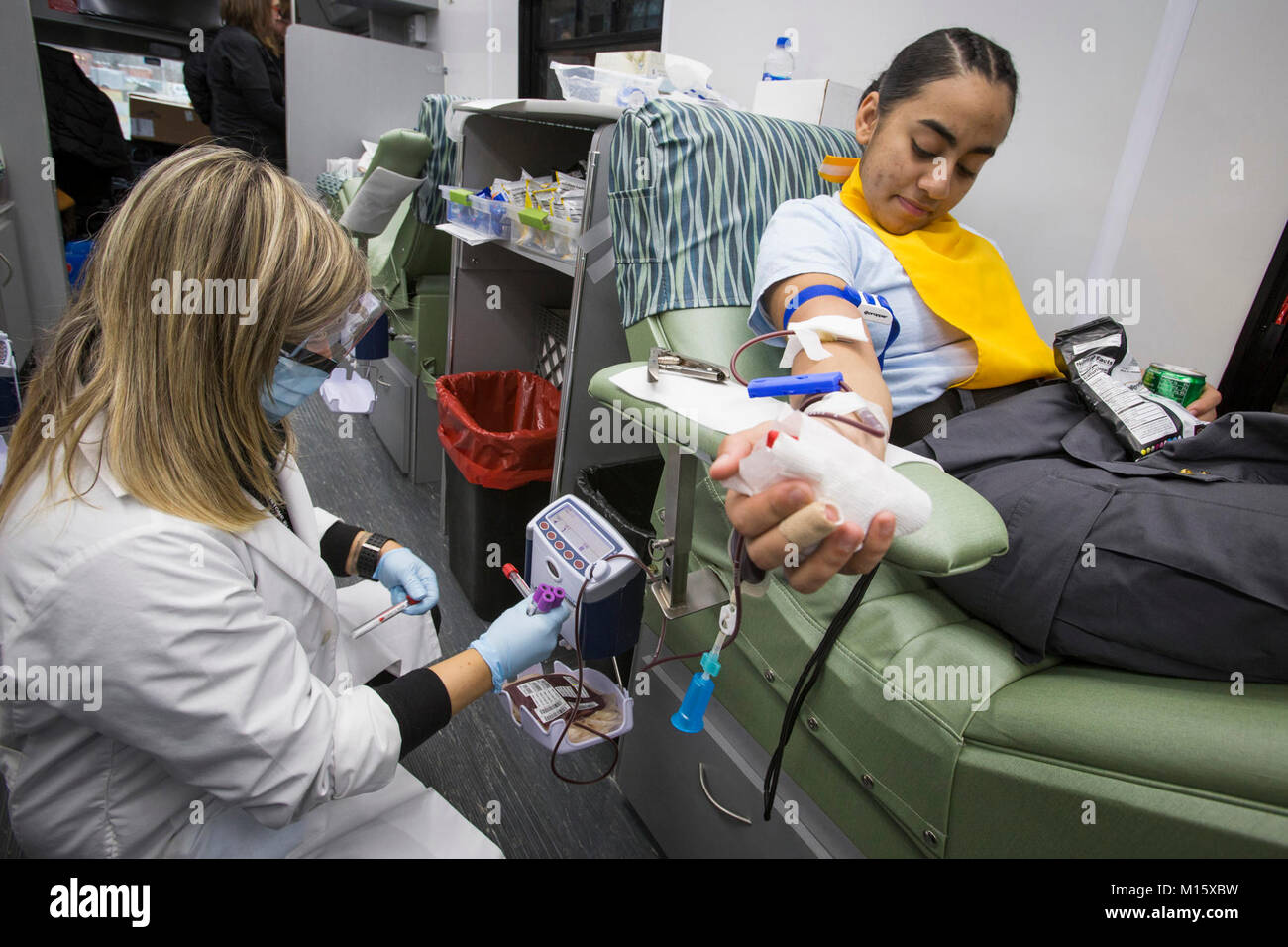 Phlebotomist Sandra Rodriguez, left, Miller Keystone Blood Center ...