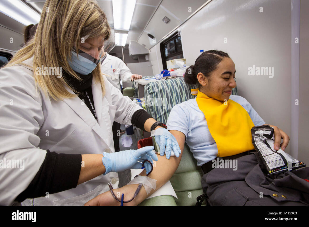 Phlebotomist Sandra Rodriguez, left, Miller Keystone Blood Center ...
