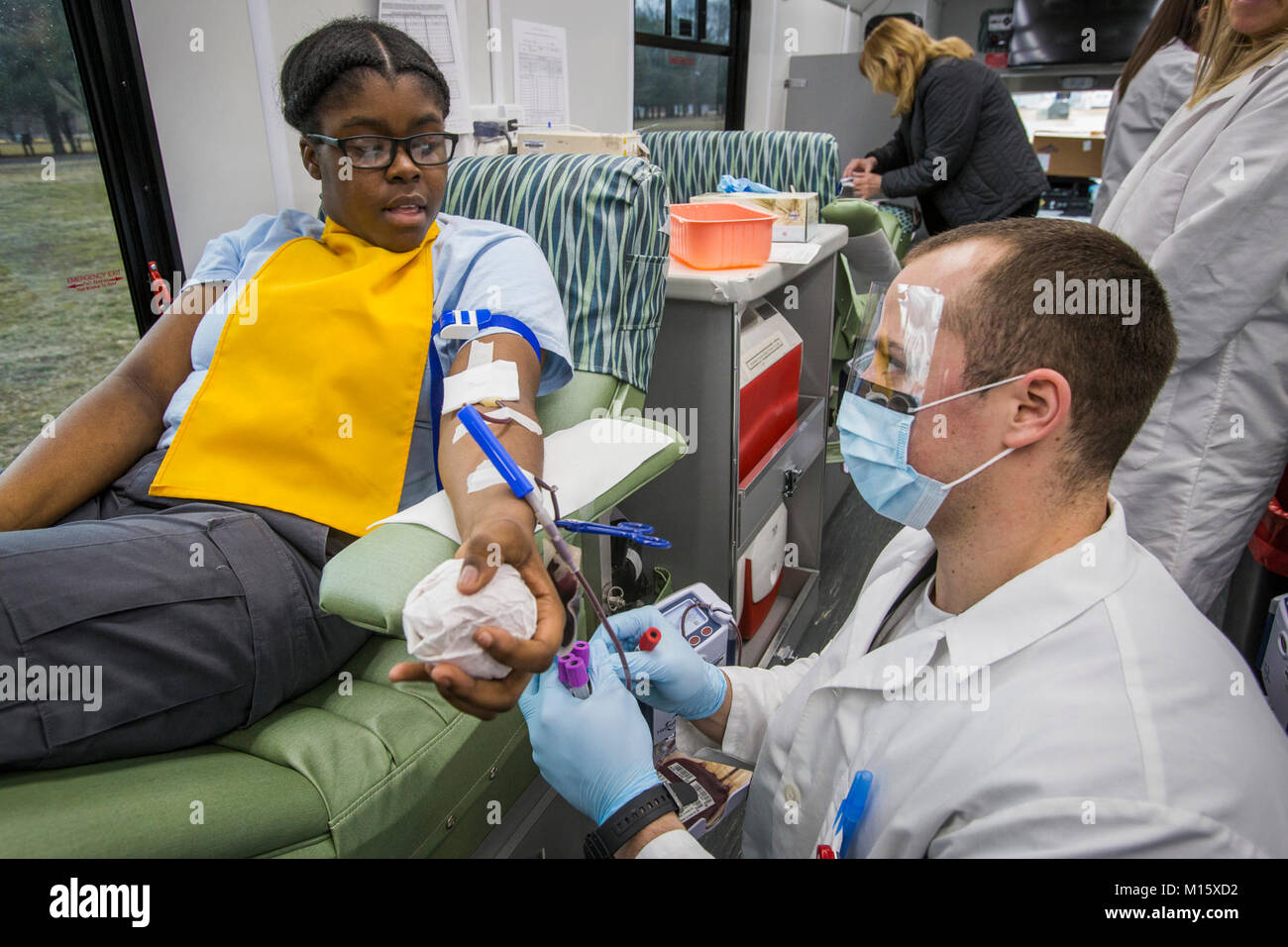 Phlebotomist Kevin Clark, right, Miller Keystone Blood Center, Ewing, N ...