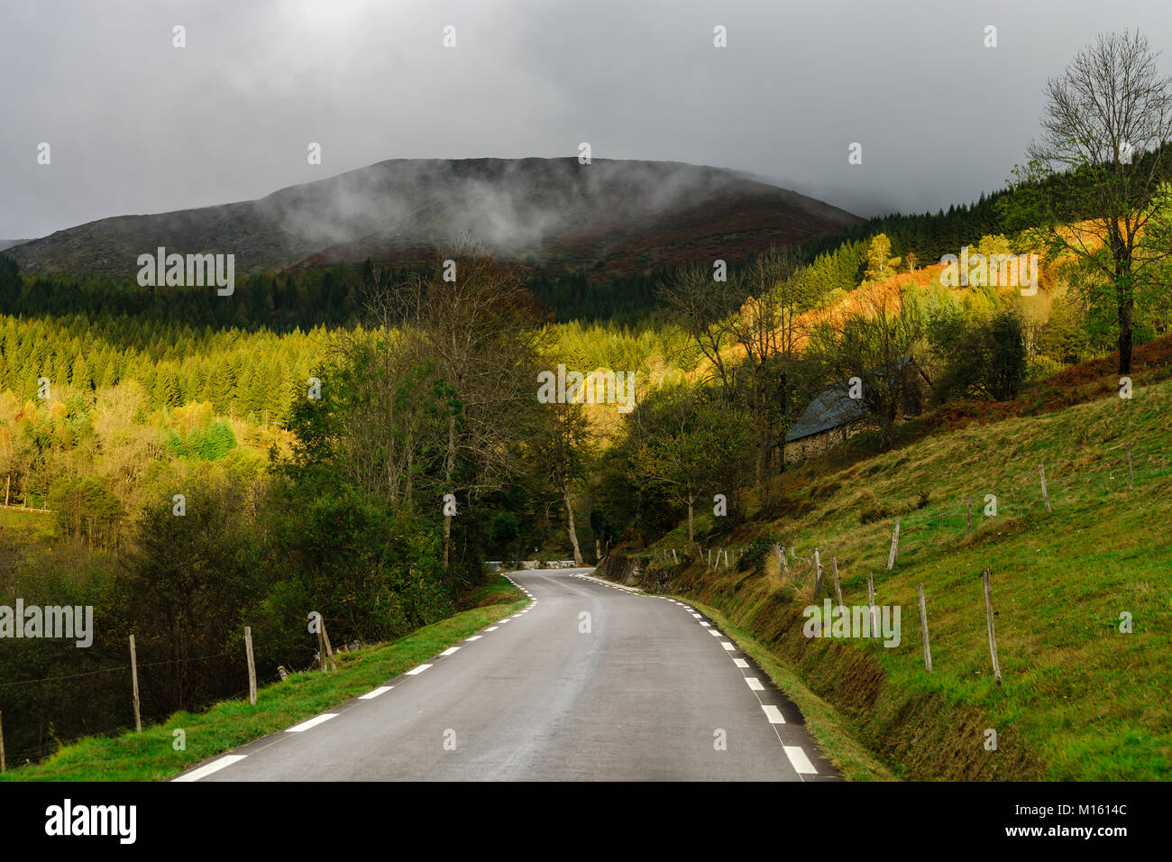 Beautiful empty road in Pyrenees. Autumn sunrise, shadows and colors of ...