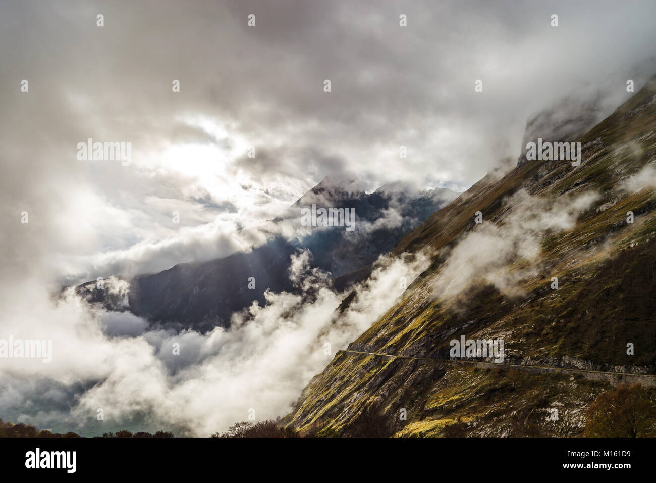 Over the clouds in high mountains, Pyrenees, foggy and cloudy, France ...