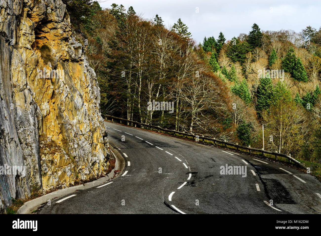 Beautiful empty road in Pyrenees. Autumn sunset, shadows and colors of ...