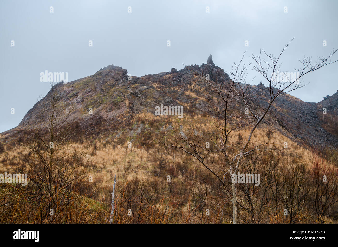 Panoramic view of Mount Usu. Mount Usu is an active stratovolcano in ...
