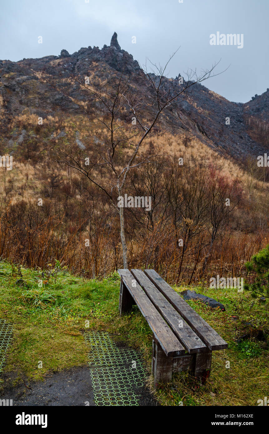 Panoramic view of Mount Usu. Mount Usu is an active stratovolcano in ...