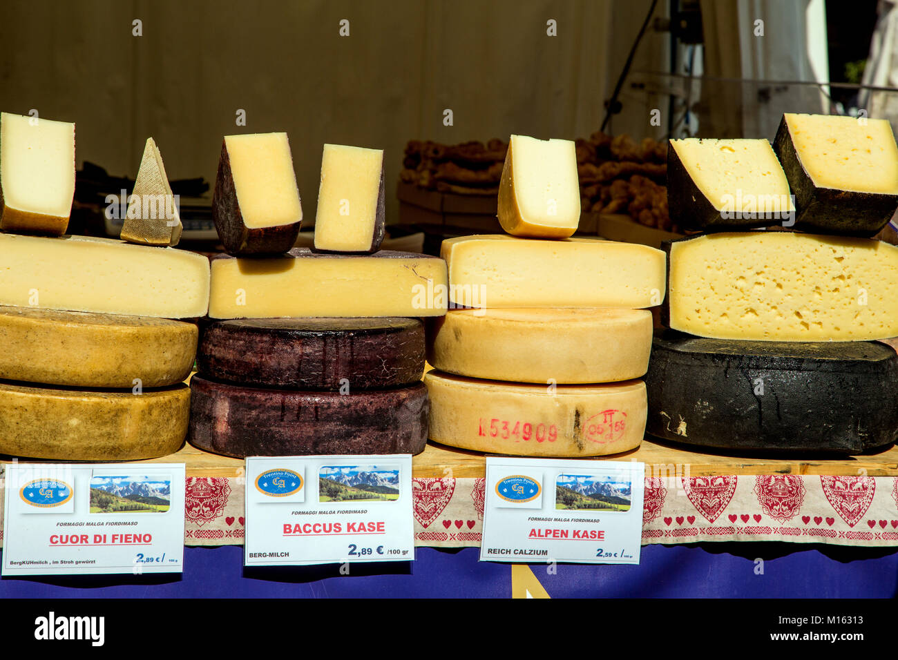 Cheese on display at outdoor market in Piazza del Popolo in Ravenna ...