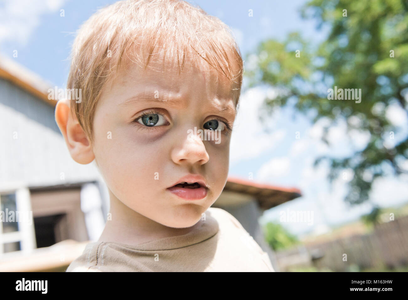 Curious child grass hi-res stock photography and images - Alamy