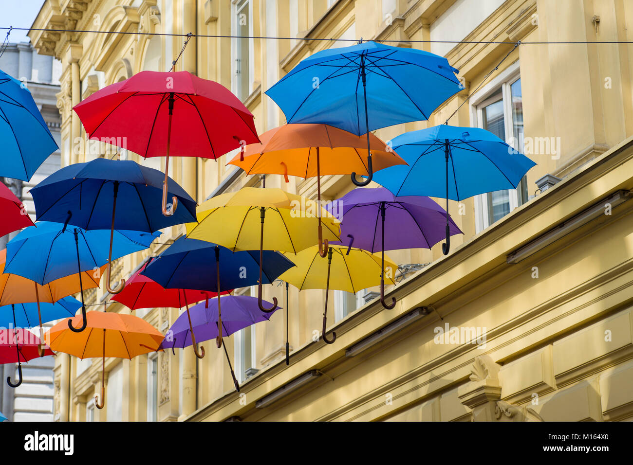 Open umbrellas for decoration in different colors Stock Photo - Alamy