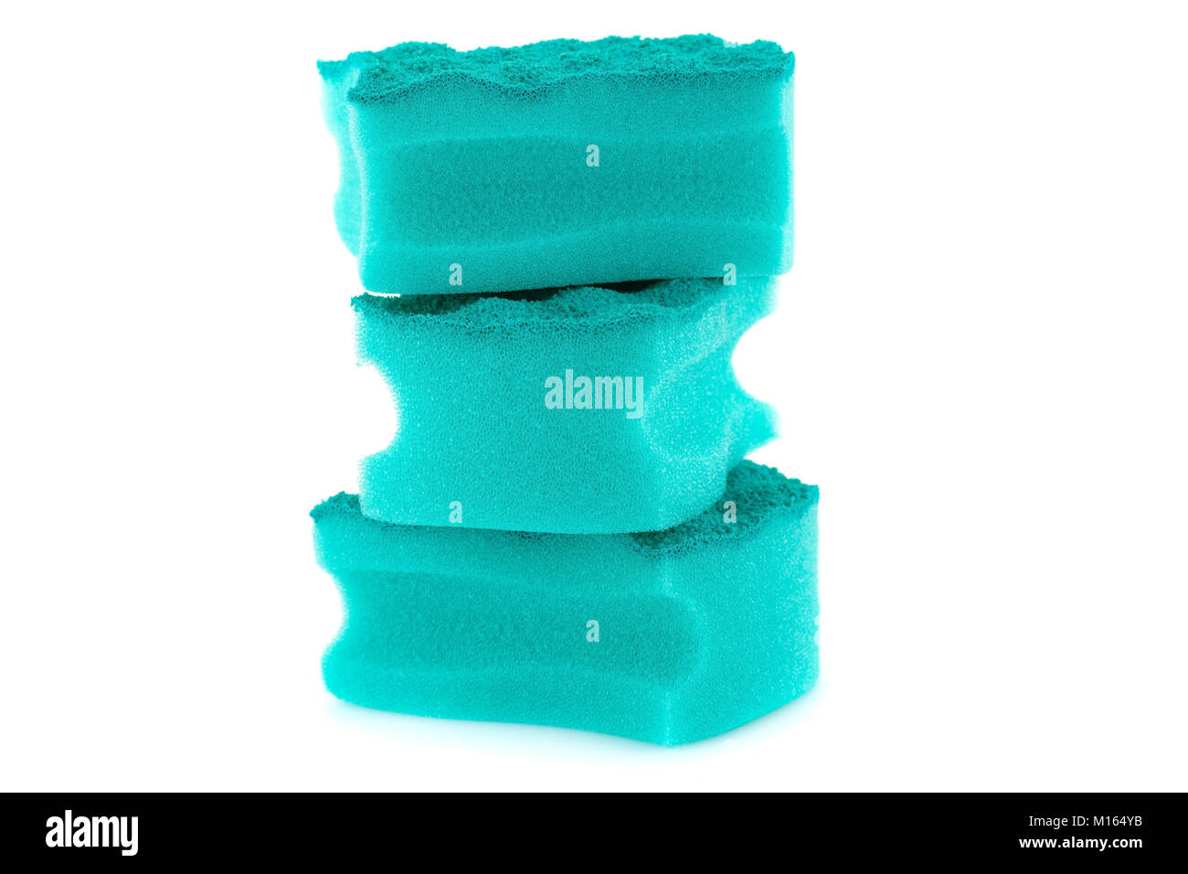 Stack of sponges isolated on white background Stock Photo - Alamy