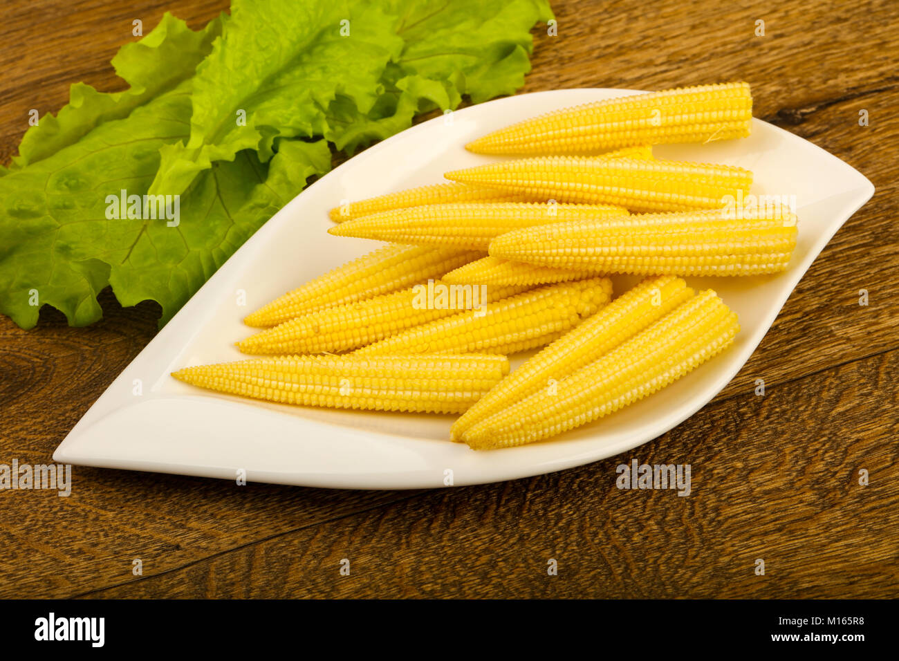 Young raw baby corn Stock Photo - Alamy
