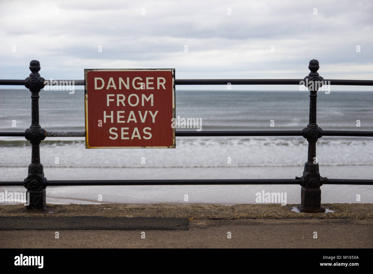 "Danger from heavy seas" sign at the waterfront somewhere in Great ...