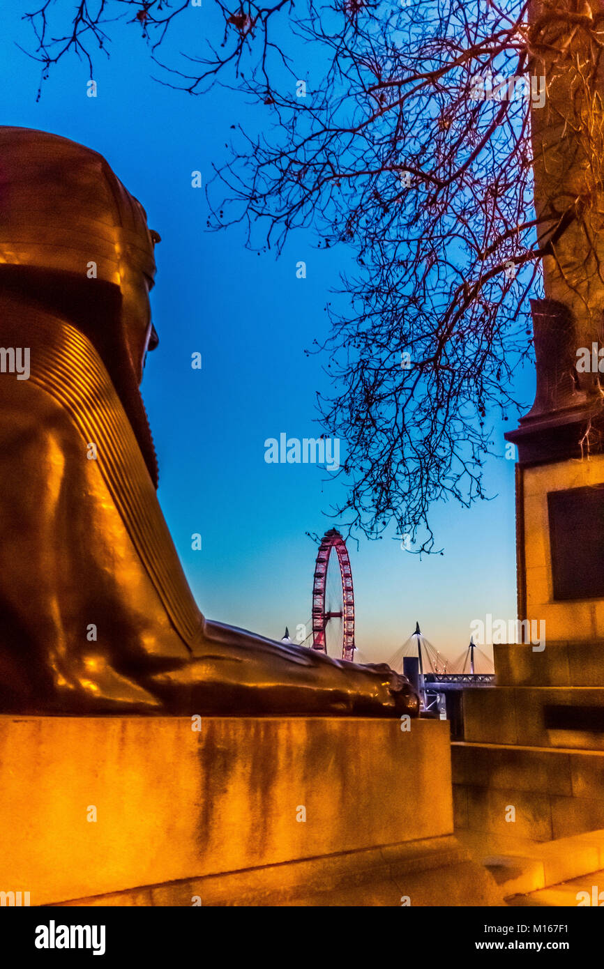 Statue on the Embankment with the London Eye Stock Photo - Alamy