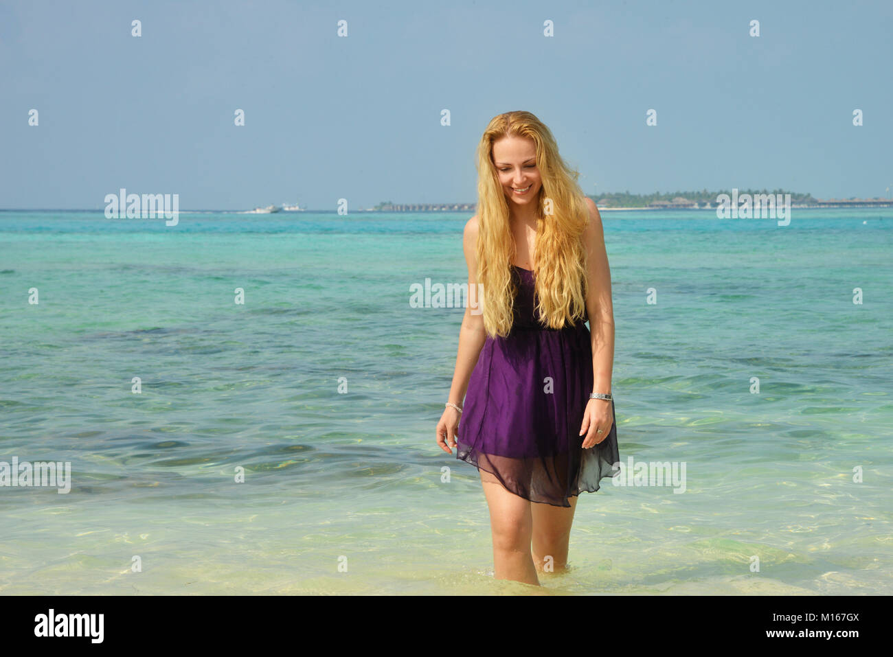Beautiful woman in Maldives - Maafushi Island Stock Photo - Alamy