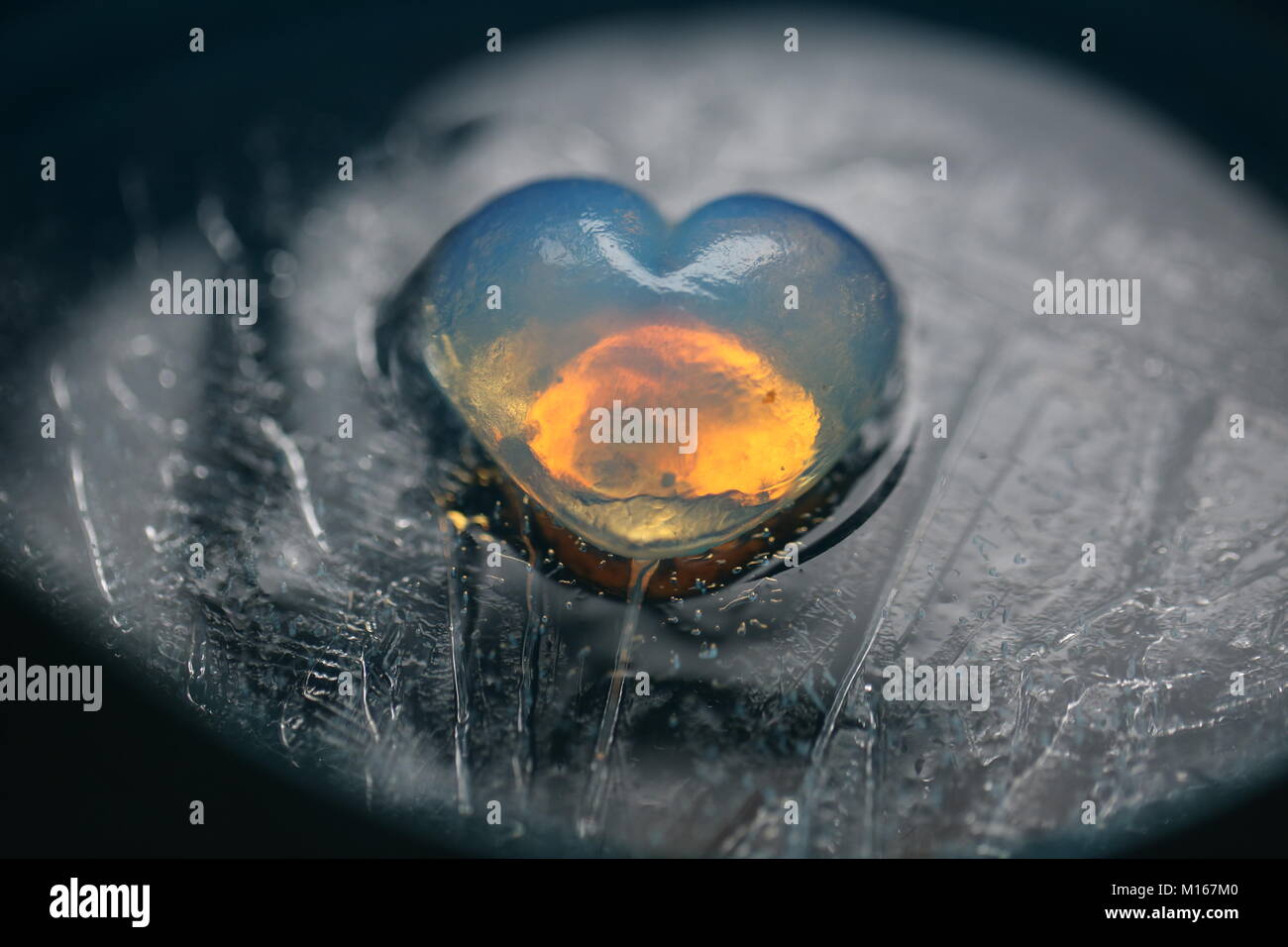 A warm heart can melt the hardest ice Stock Photo - Alamy