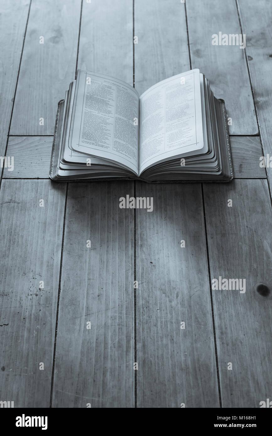 Ancient book on solid oak table Stock Photo - Alamy