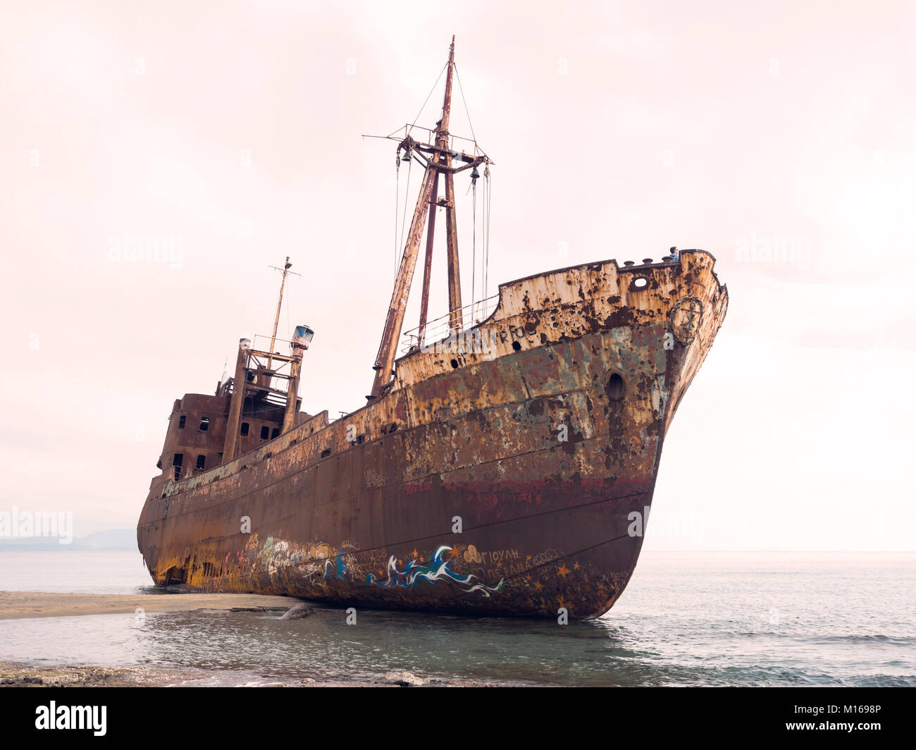 Small shipwreck on the beach left there for years, Gytheio, Greece ...