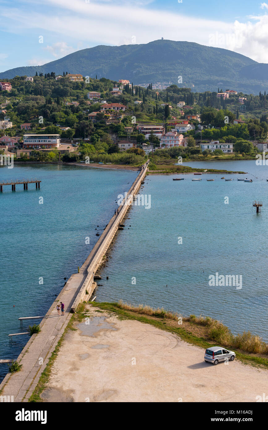 Causeway with with view of houses on hills. Corfu island, Greece Stock ...