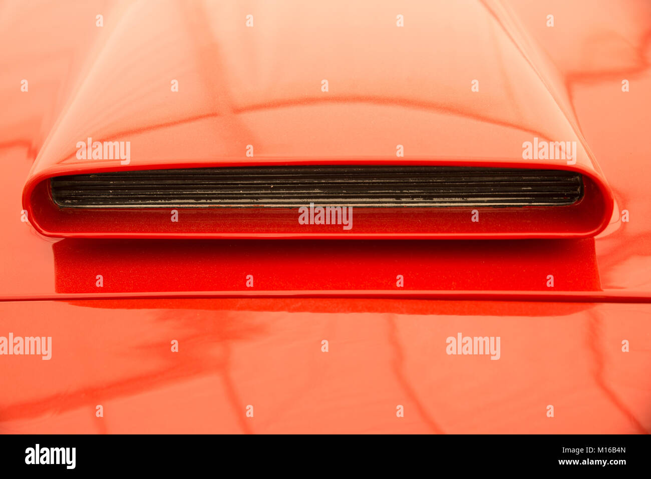 Sportive looking air intake on the hood of a vintage car Stock Photo ...