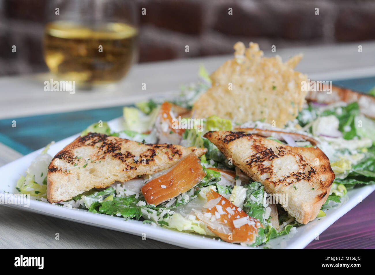 Ceasar salad with smoked trout and Parmesan cheese Stock Photo - Alamy