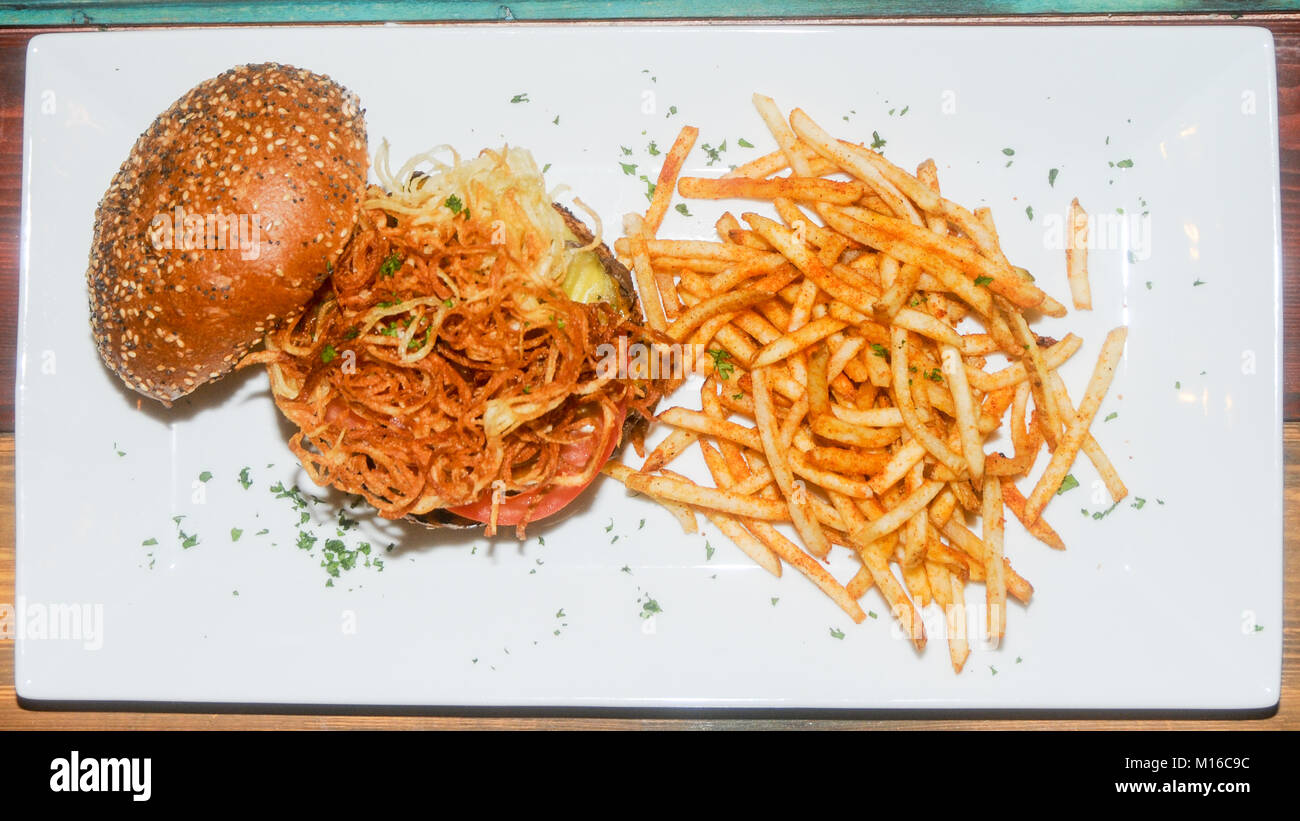 Cheeseburger with French Fries Stock Photo - Alamy