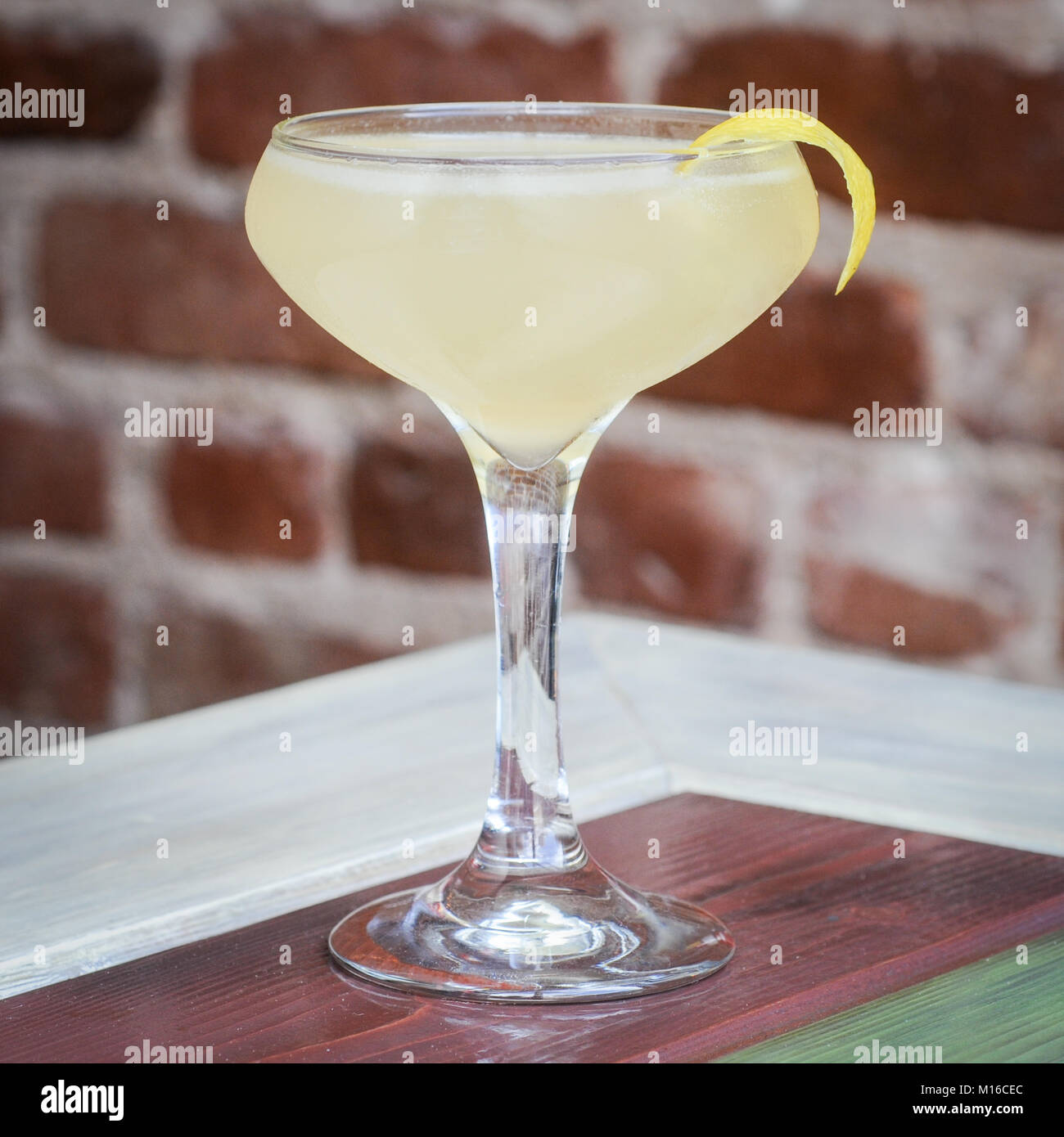 Clear vodka cocktails with lemon Stock Photo - Alamy