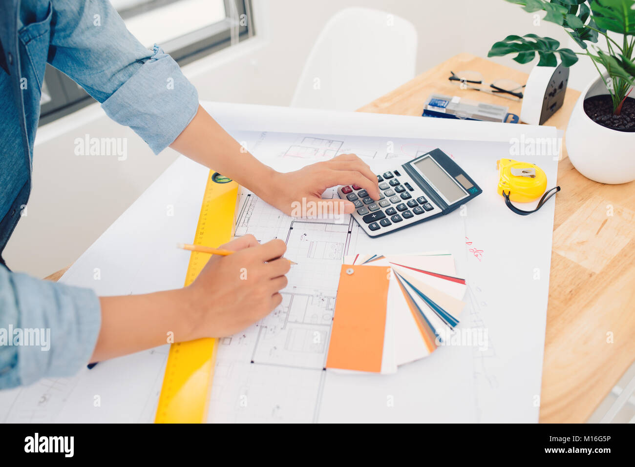 Architect concept, Architects office working with blueprints Stock ...