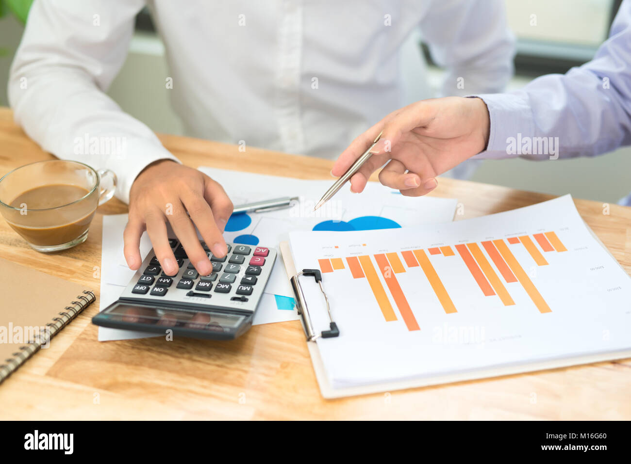 Business man calculating budget numbers, Invoices and financial adviser ...