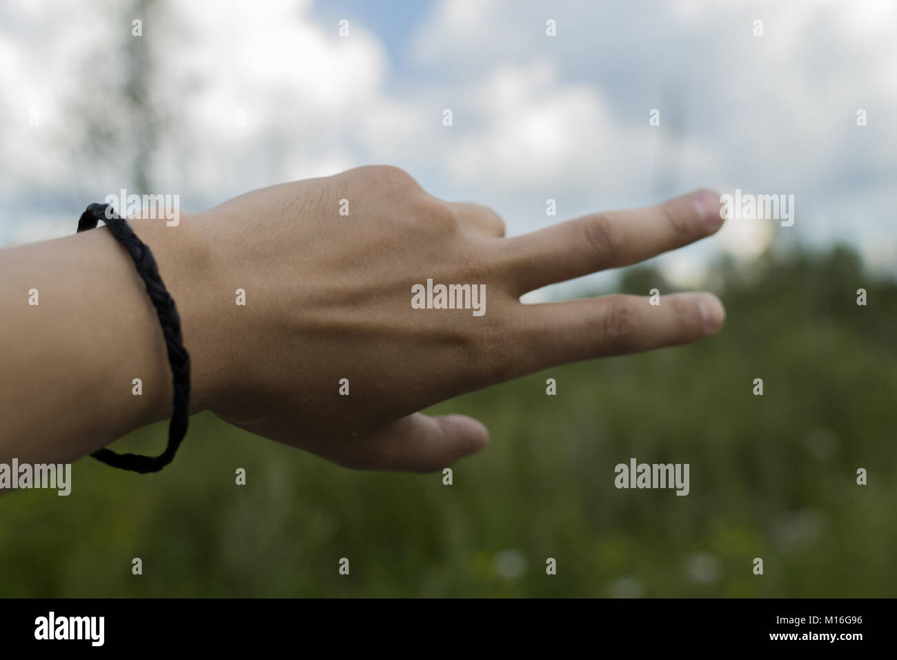 hand sign peace hand men sign of goodness and peace Stock Photo - Alamy