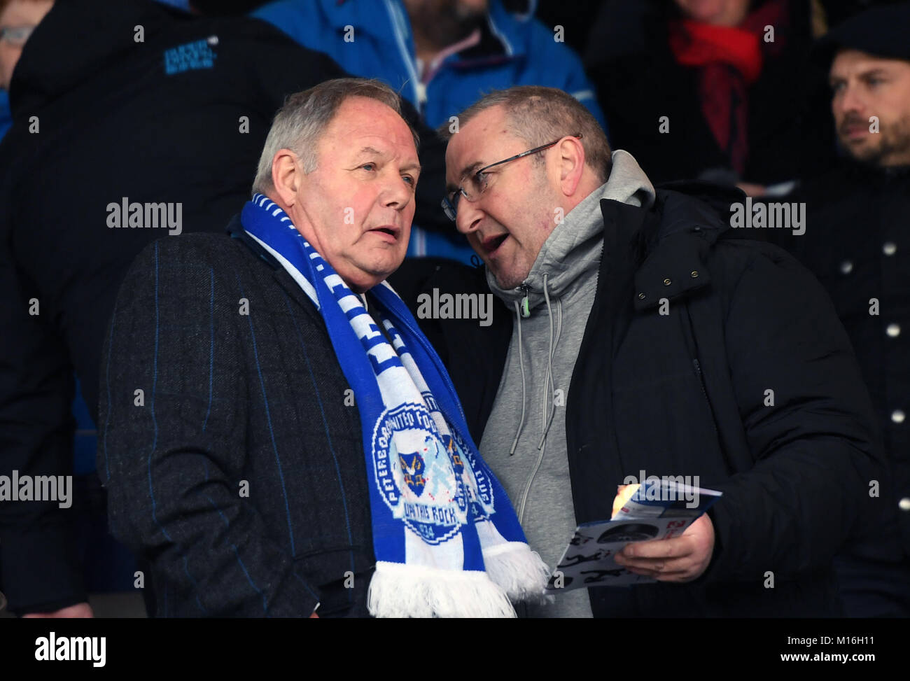 Peterborough United director of football Barry Fry (left) in the stands ...