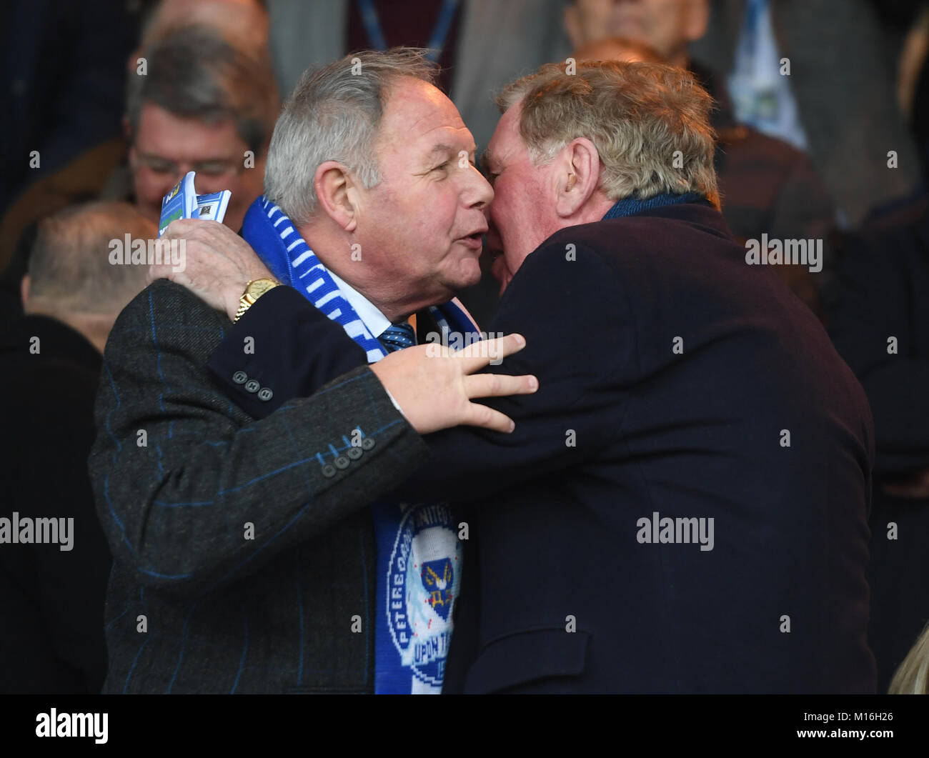 Peterborough United director of football Barry Fry (left) in the stands ...