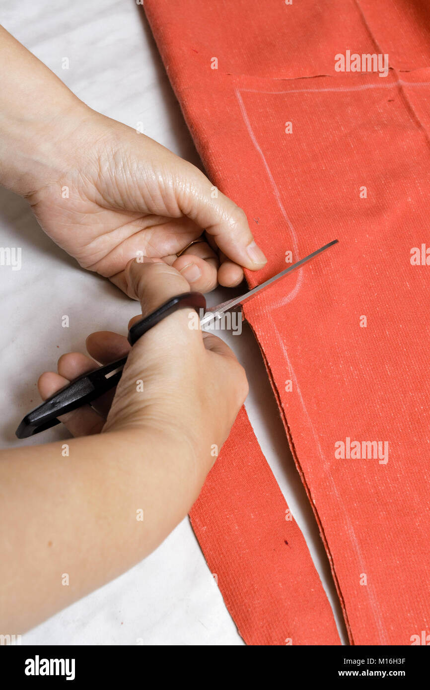Cutting out cloth hi-res stock photography and images - Alamy