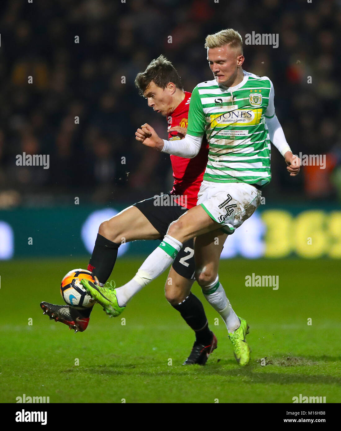 Manchester United's Ander Herrera (left) and Yeovil Town's Sam Surridge ...